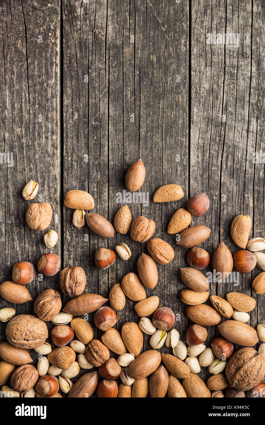 Different types of nuts in the nutshell. Hazelnuts, walnuts, almonds ...