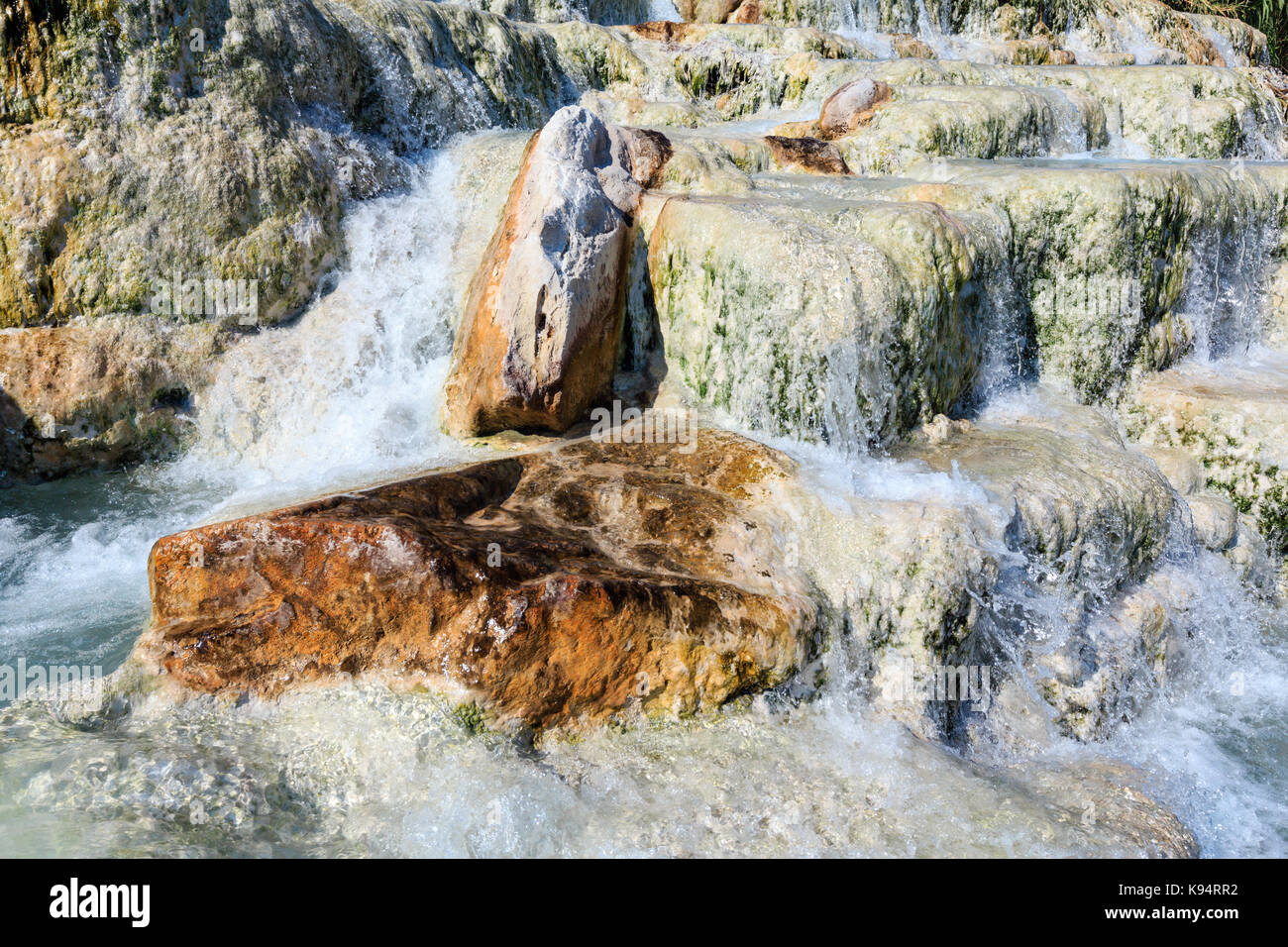 Natural spa with waterfalls and hot springs at Saturnia thermal baths ...