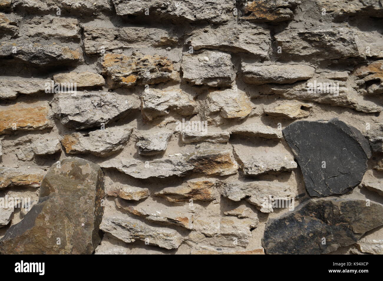 Natural stone wall texture for background Stock Photo - Alamy
