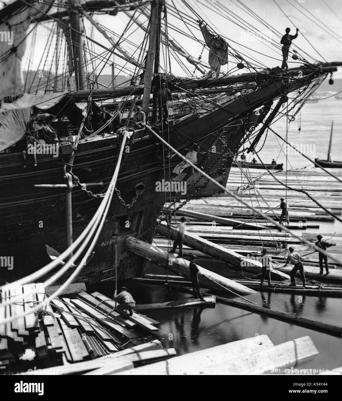 Loading ship with square timber through the bow port Quebec City QC ...