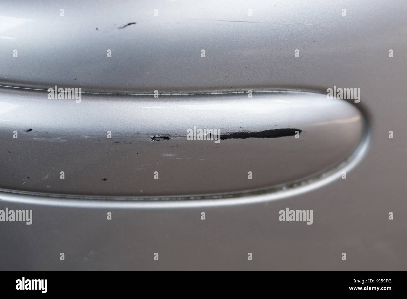 Scratch on car with silver paint Stock Photo - Alamy