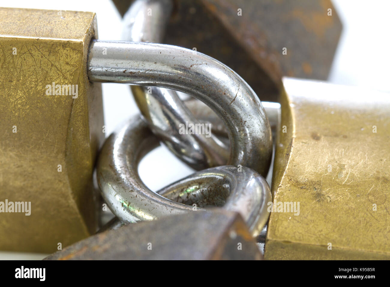Close up on locked padlock over white background concept Stock Photo ...