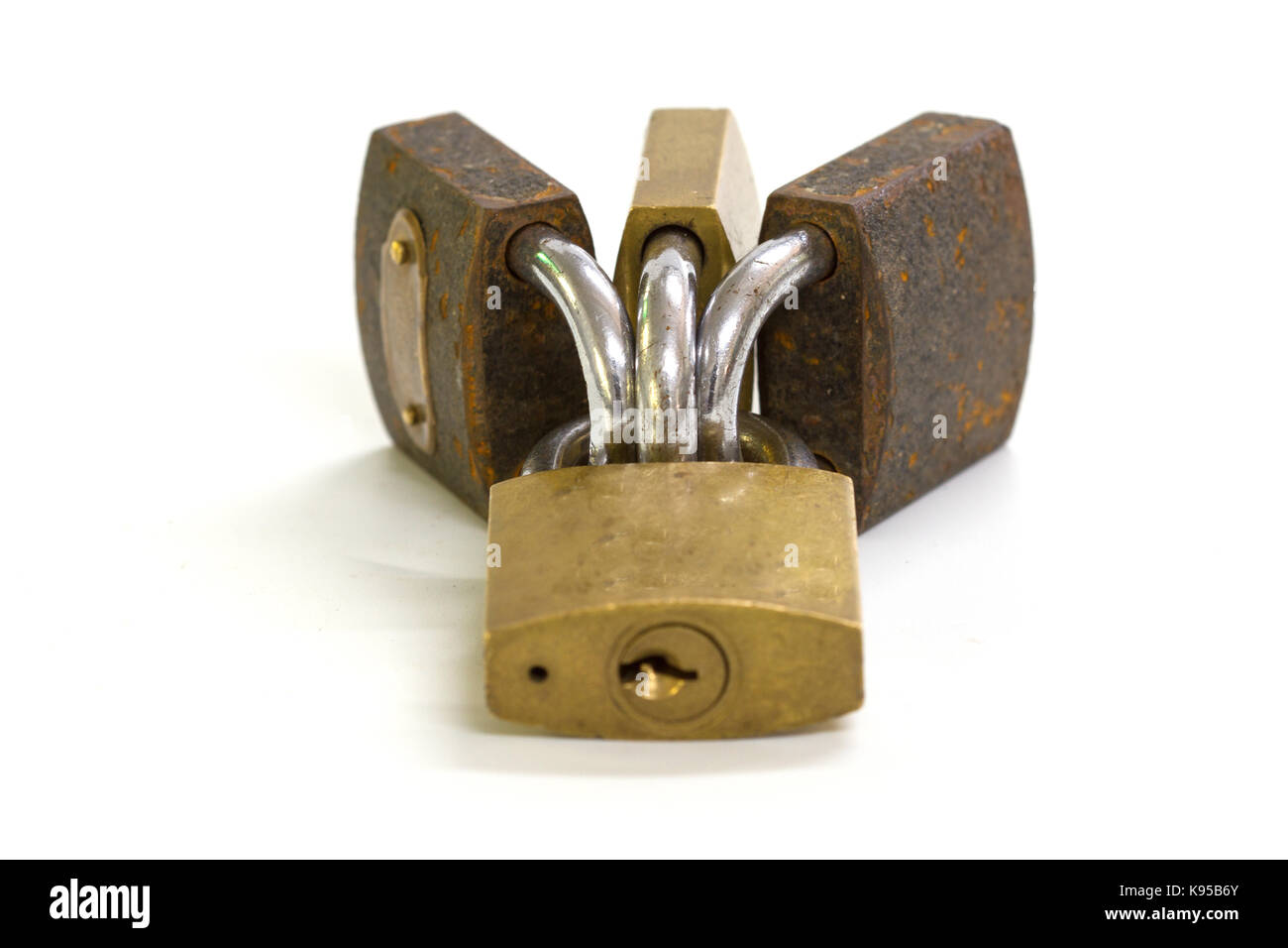 Close up on locked padlock over white background concept Stock Photo ...