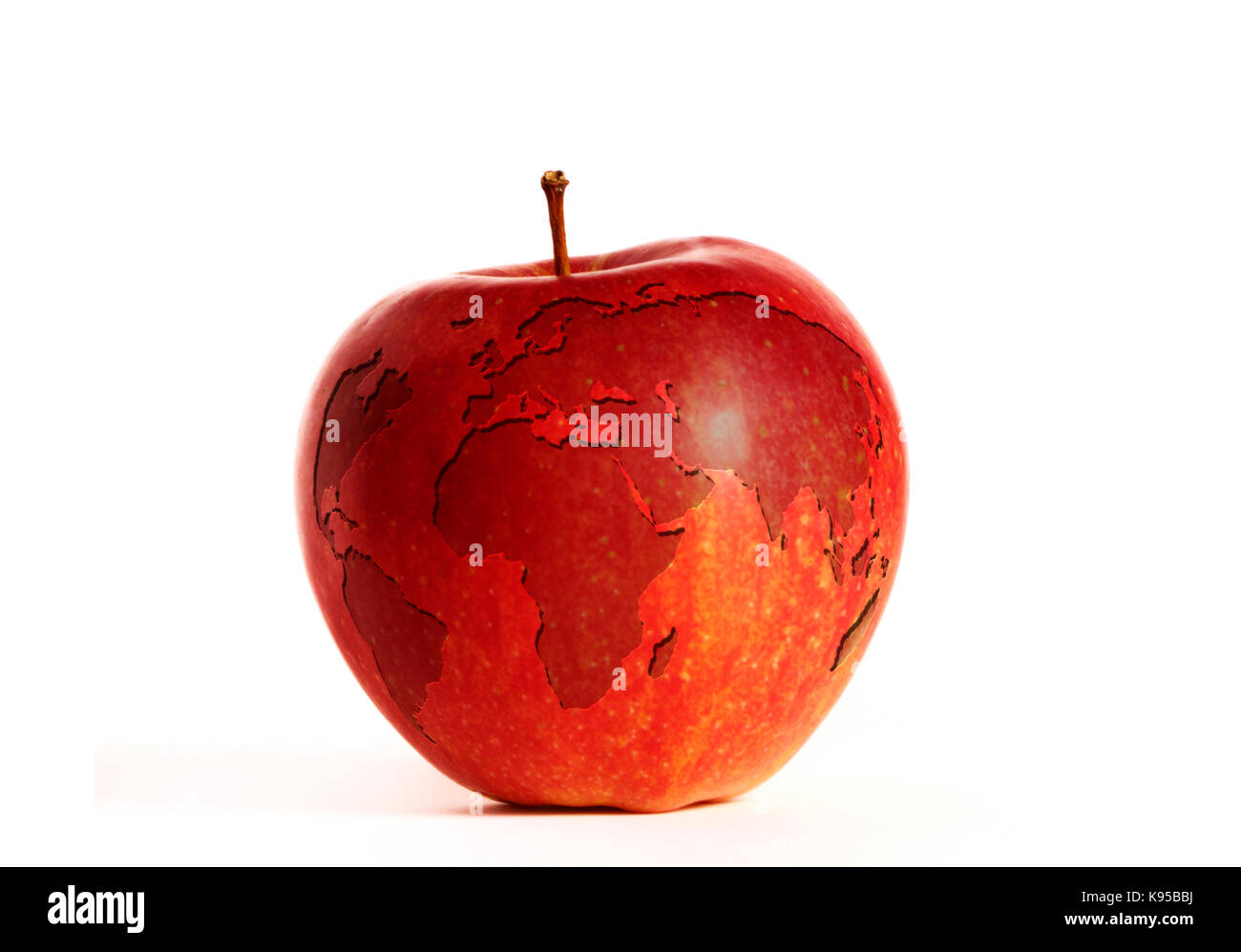 world map carved into a red apple Stock Photo - Alamy