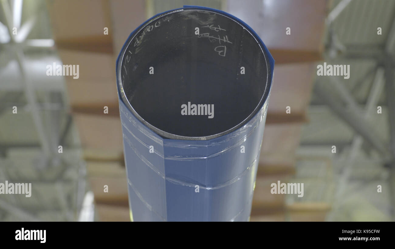 Working with Crane over head in Steel warehouse. Pipe lift on overhead ...