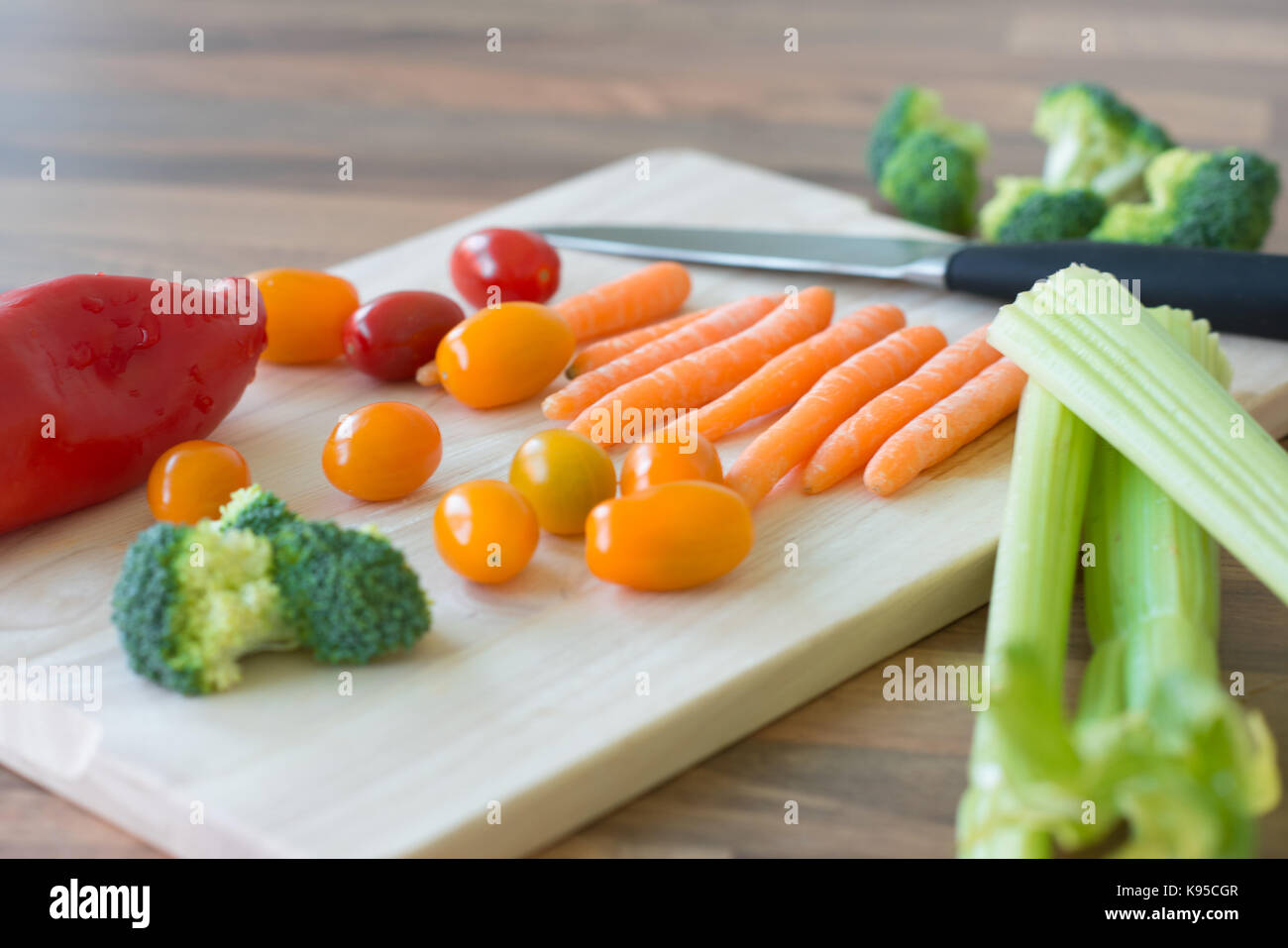 Colorful vegetables in modern bright kitchen interior Stock Photo - Alamy