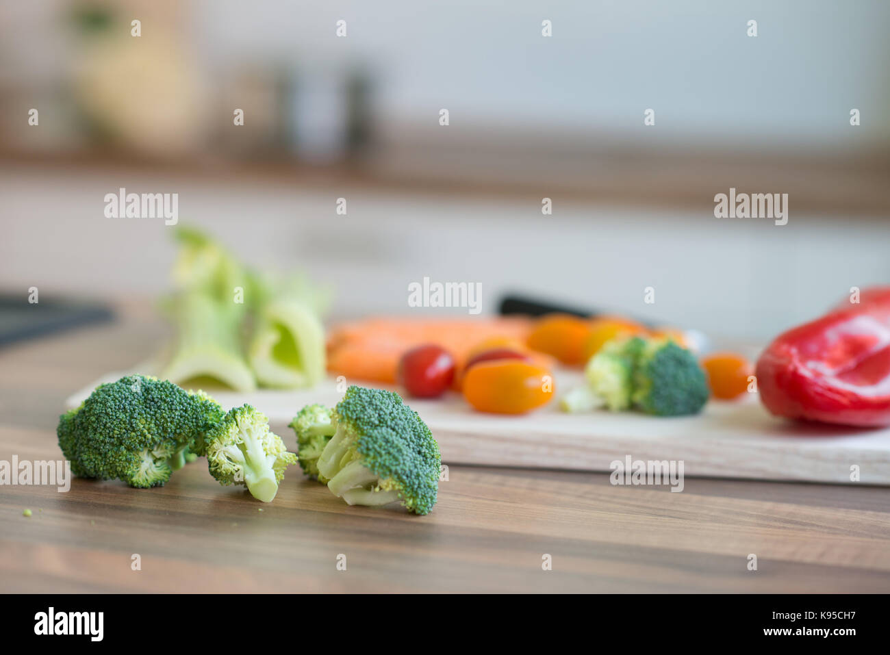 Colorful vegetables in modern bright kitchen interior Stock Photo - Alamy