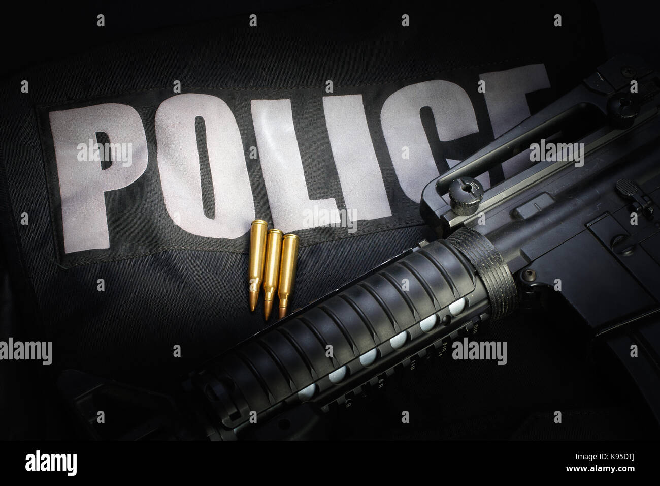 Police equipment on black background Stock Photo - Alamy