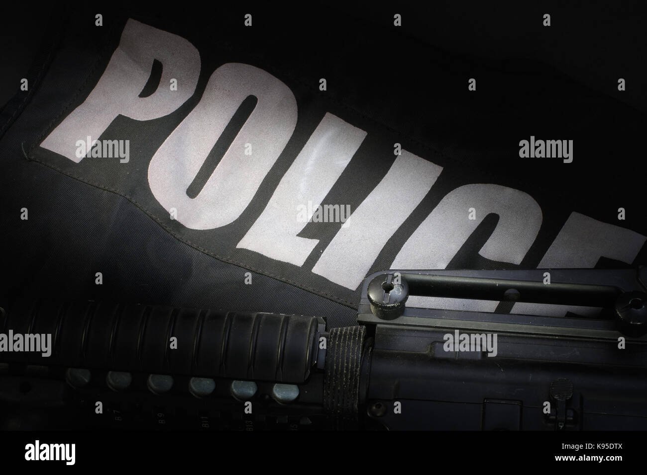 Police equipment on black background Stock Photo - Alamy