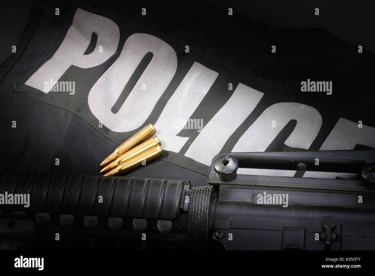 Police equipment on black background Stock Photo - Alamy