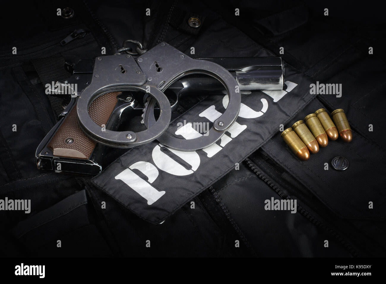 Police equipment on black background Stock Photo - Alamy
