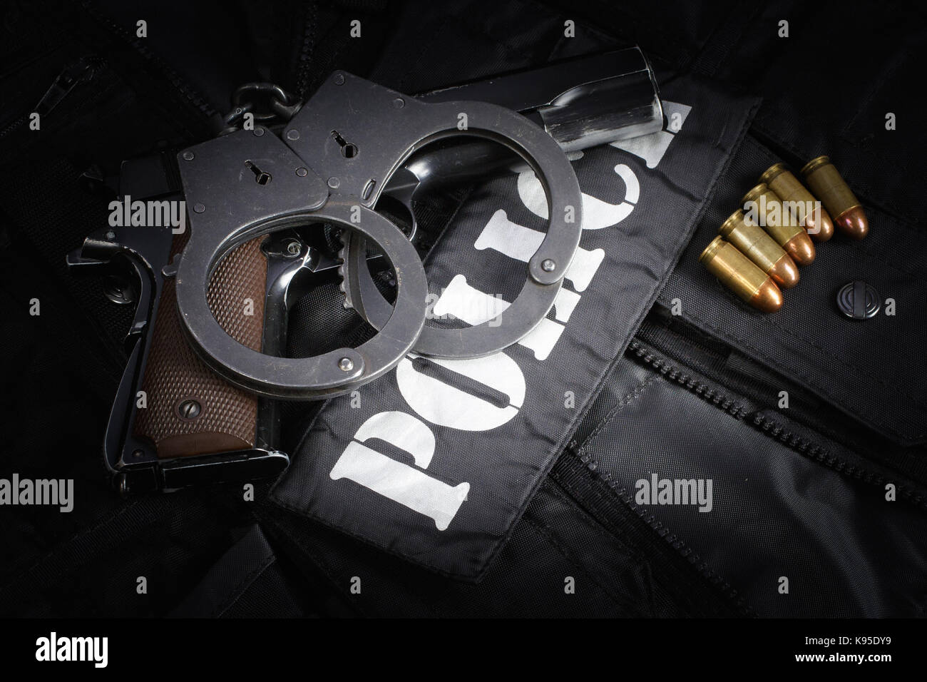 Police equipment on black background Stock Photo - Alamy