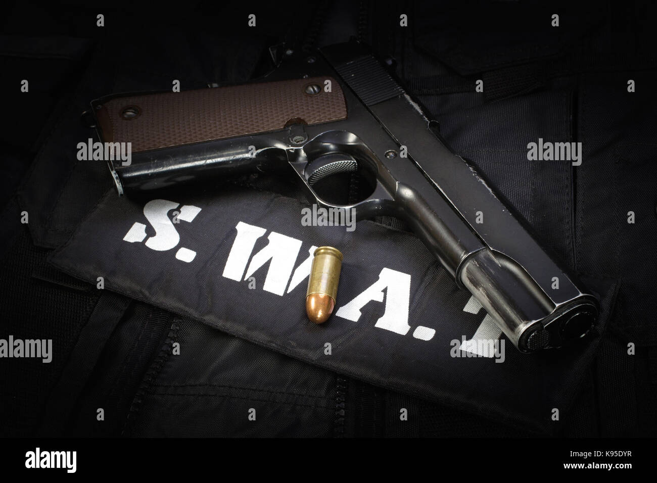 SWAT equipment on black background Stock Photo - Alamy