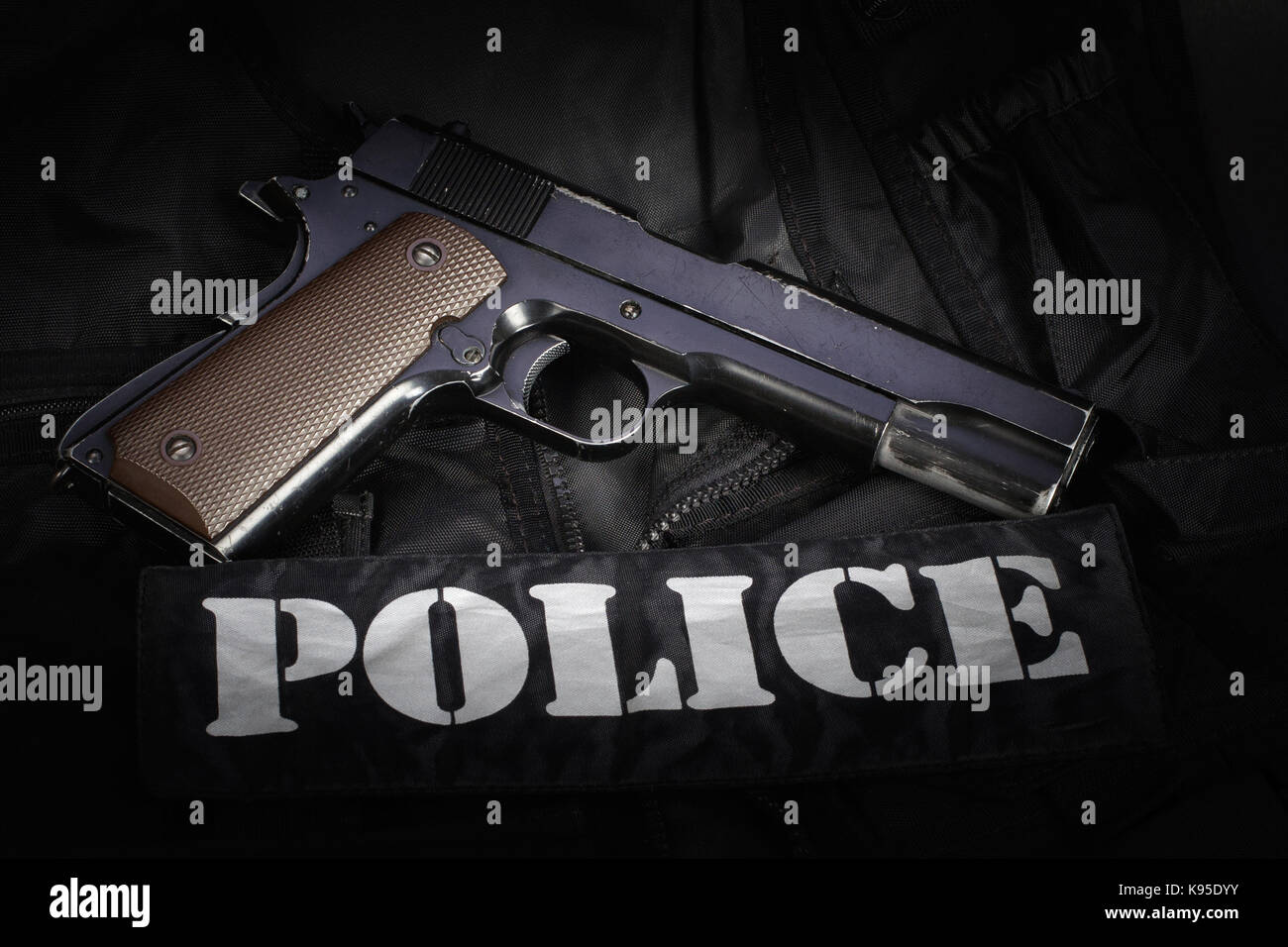 Police equipment on black background Stock Photo - Alamy