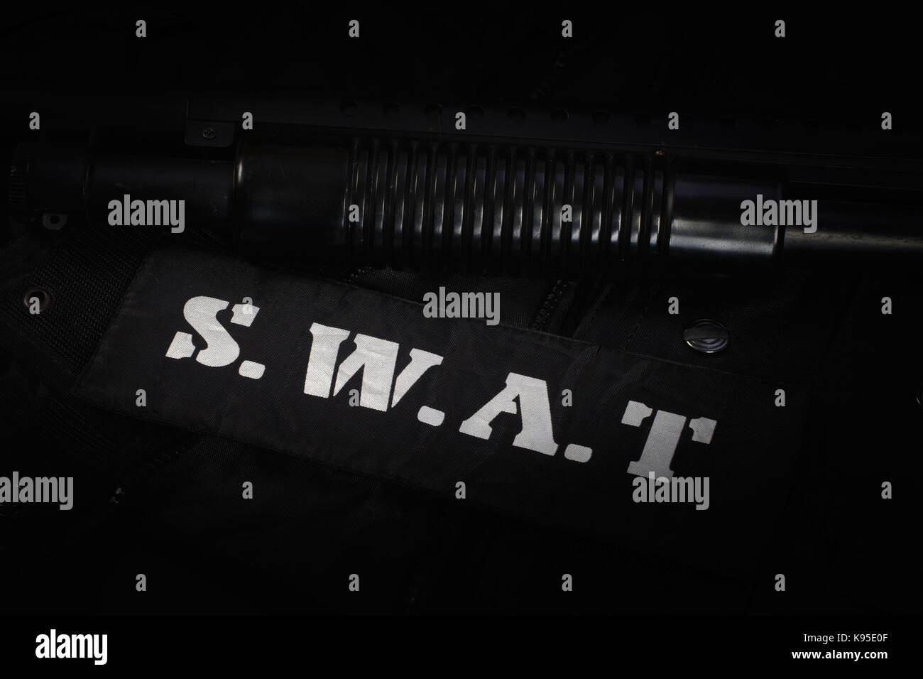 SWAT equipment on black background Stock Photo - Alamy