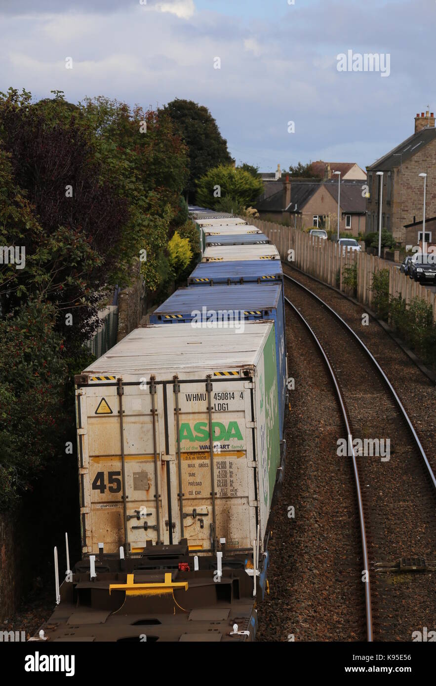 Elevated view of freight train passing Carnoustie Angus Scotland ...