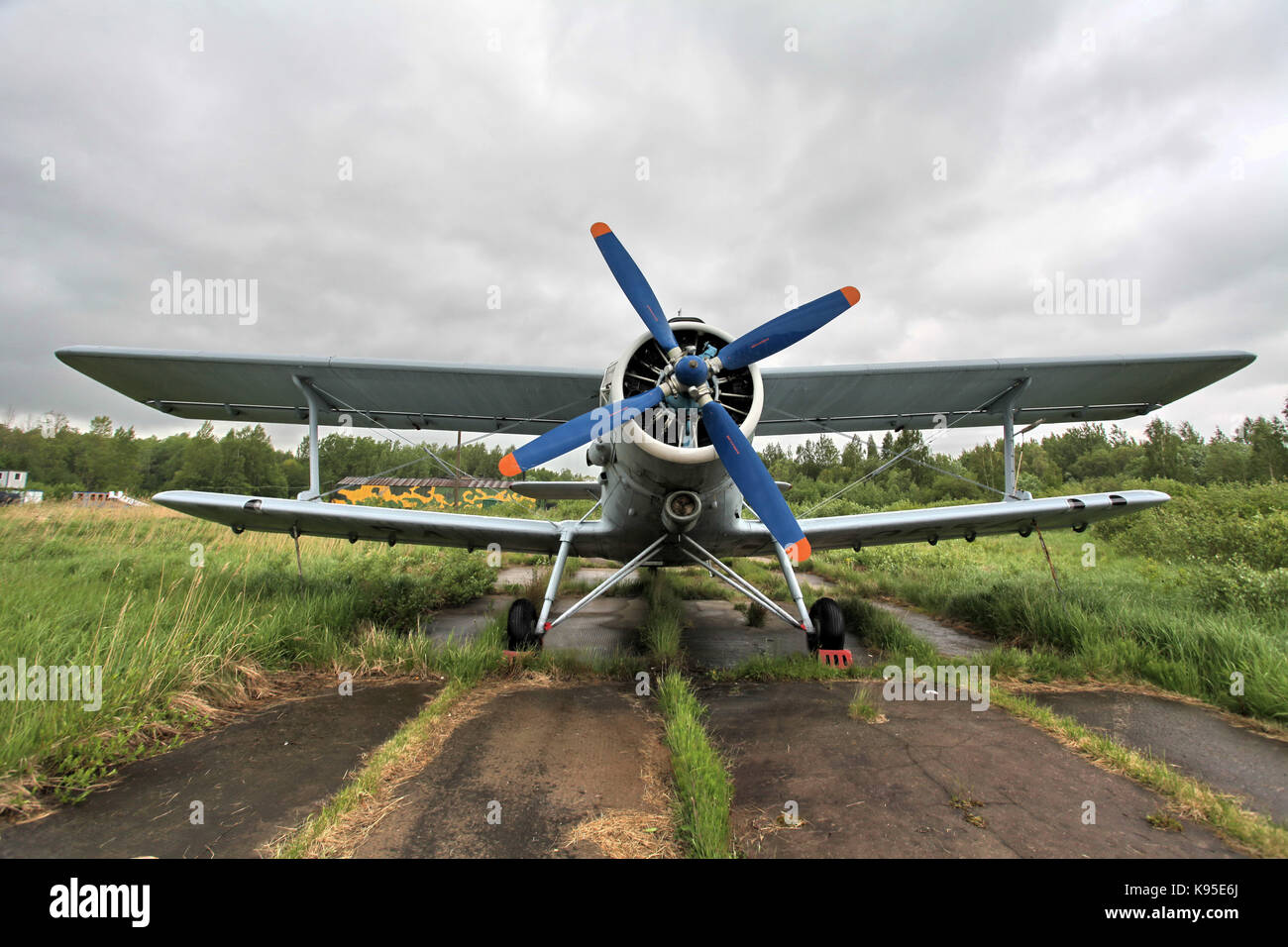 Biplane on the airfield, front view Stock Photo - Alamy