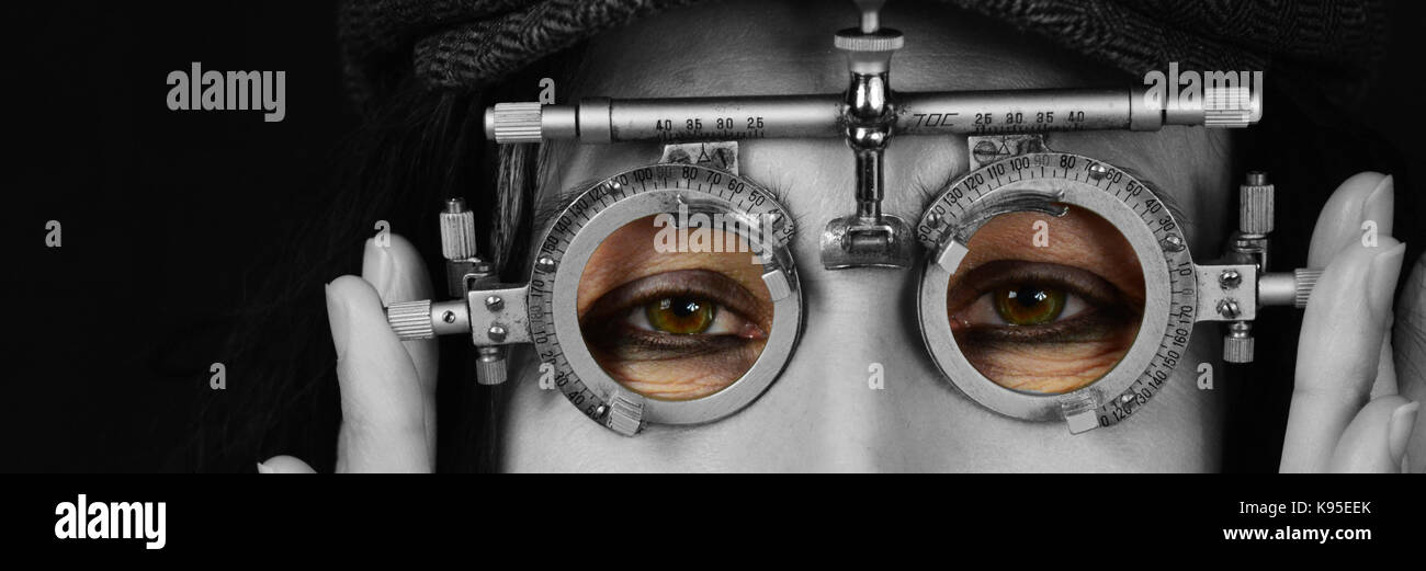 Woman in eye testing glasses Stock Photo - Alamy