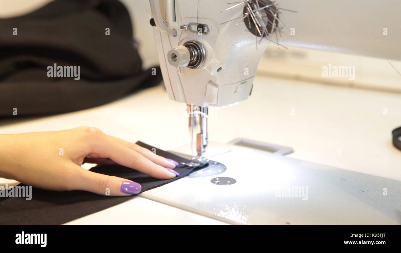 Tailor.Hands notch tailor tailor's scissors cloth. Female tailor ...