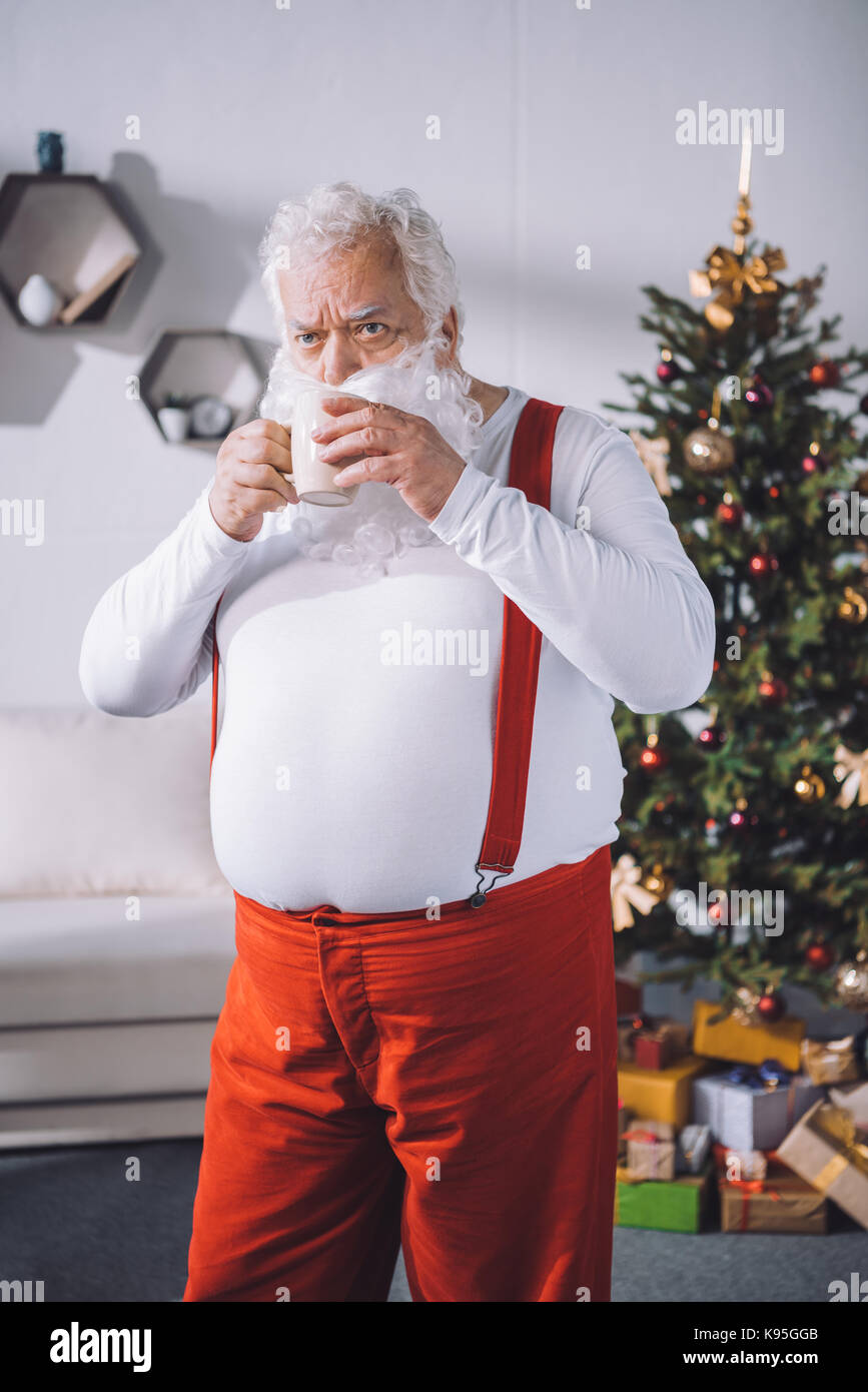 santa claus drinking coffee Stock Photo - Alamy