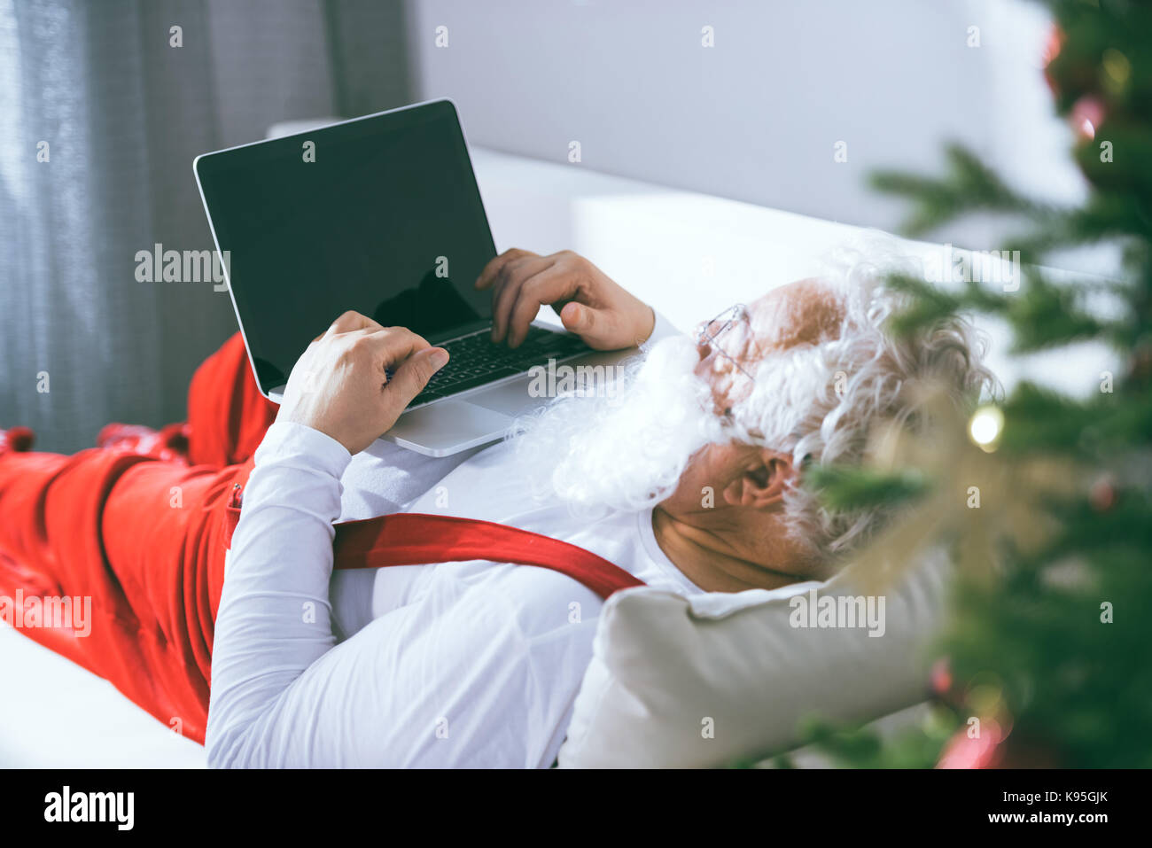 santa claus using laptop Stock Photo - Alamy