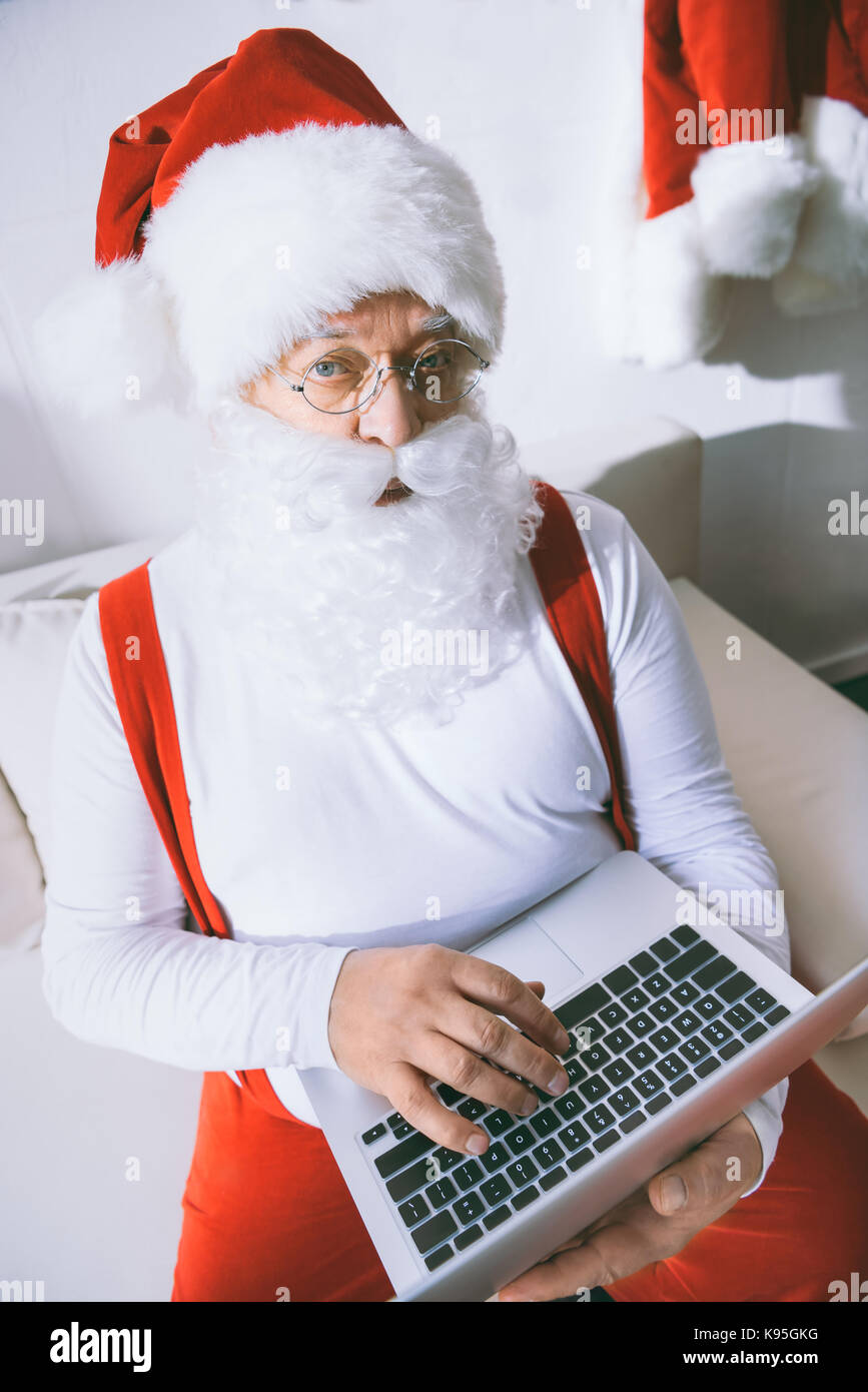 santa claus with laptop Stock Photo - Alamy