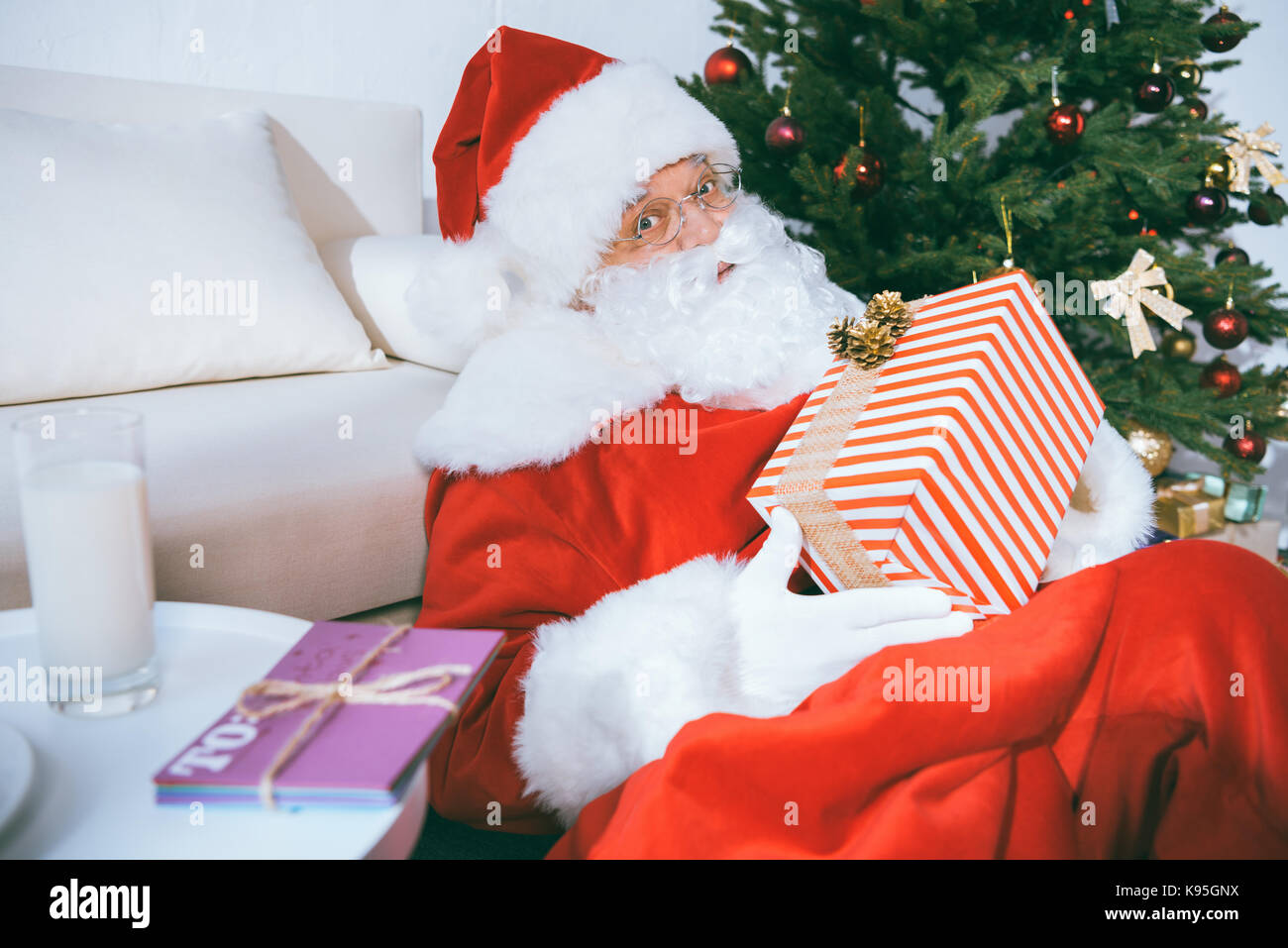santa claus with gift Stock Photo - Alamy