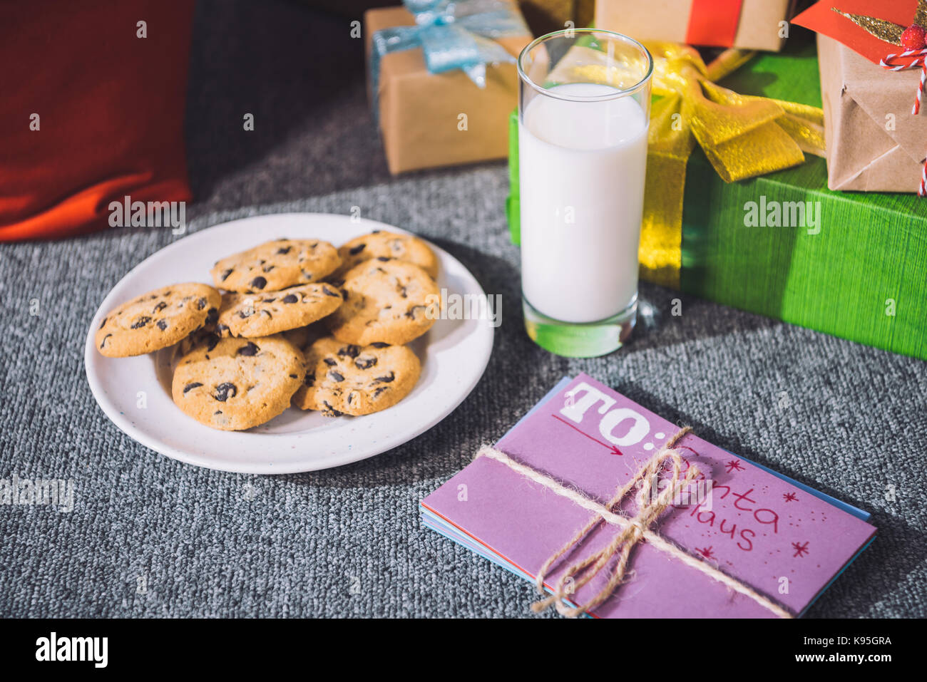 glass of milk, cookies and letter for santa Stock Photo - Alamy