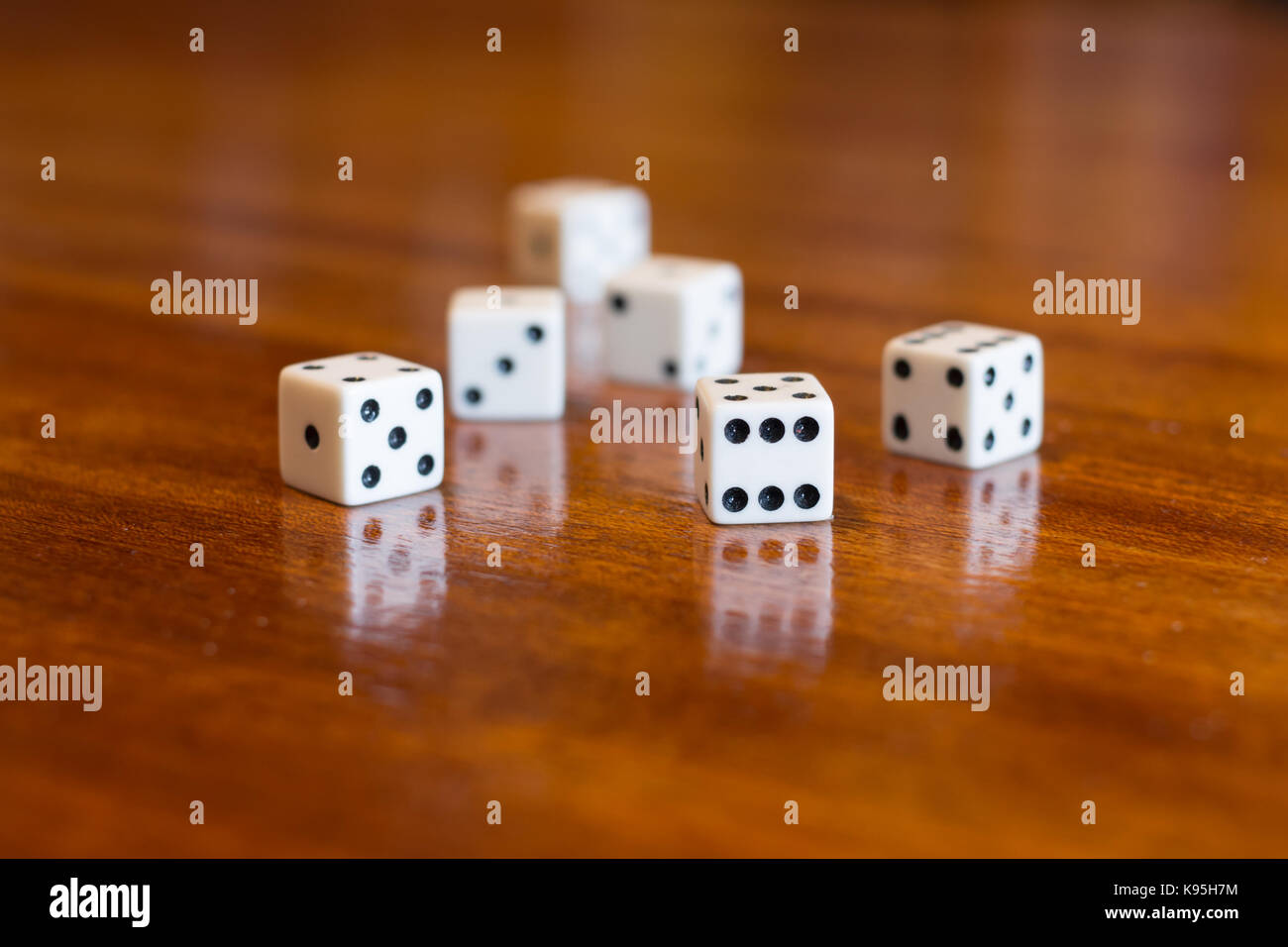 Dice on the table hi-res stock photography and images - Alamy