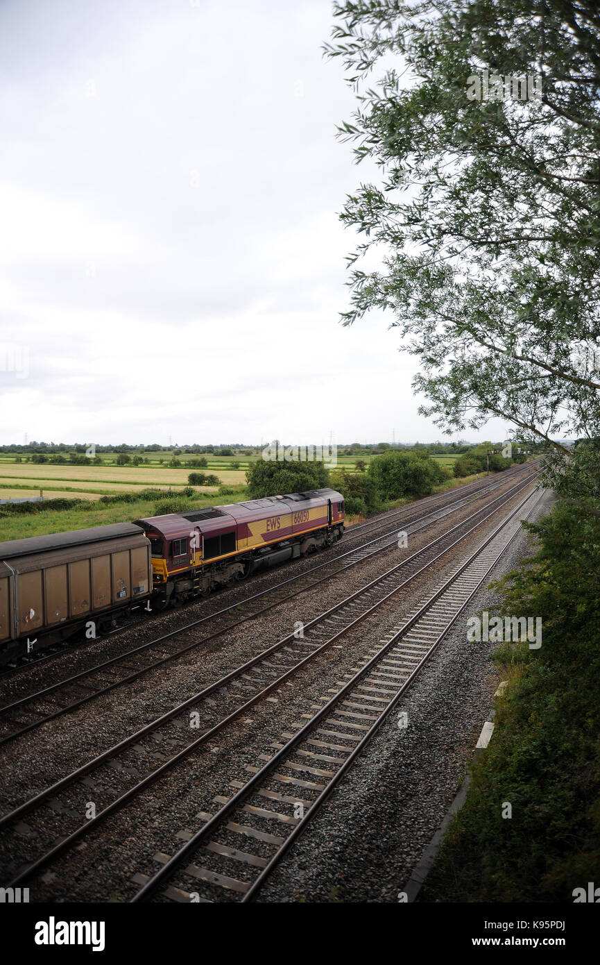 66050 heads west along the Down Relief Line at Marshfield Stock Photo ...