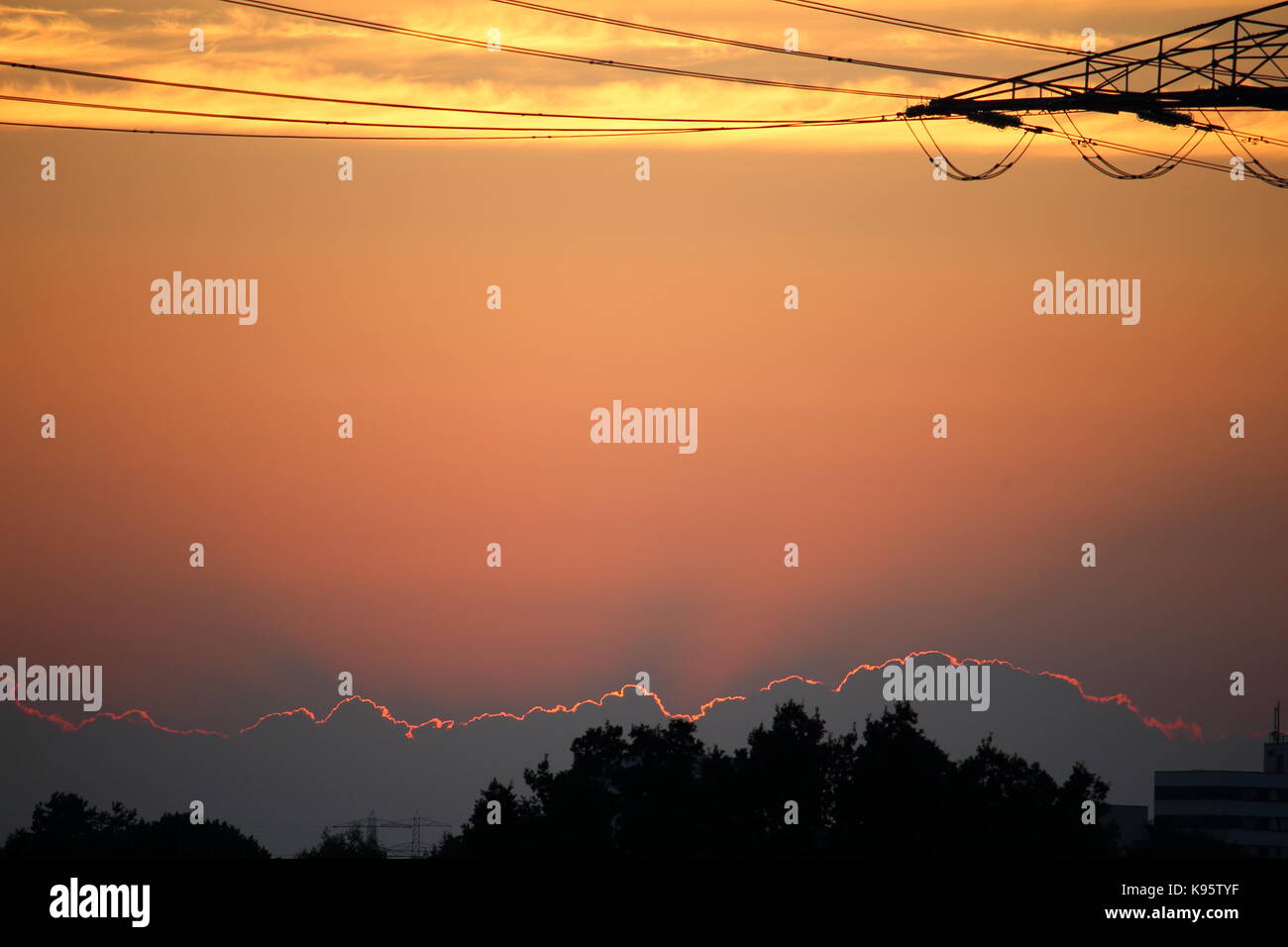 Transmission line after sunset Stock Photo - Alamy