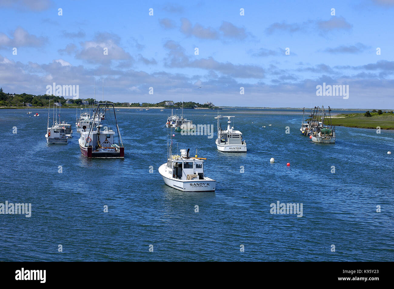 Moored fishing boats at rest - Chatham Harbor on Cape Cod Stock Photo ...