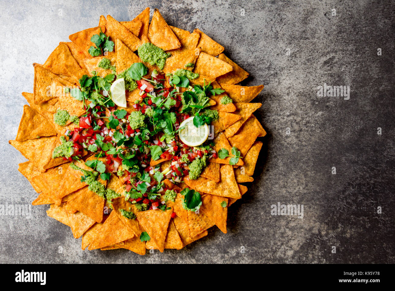 Nachos. Totopos with sauces. Mexican food concept. Yellow corn totopos ...
