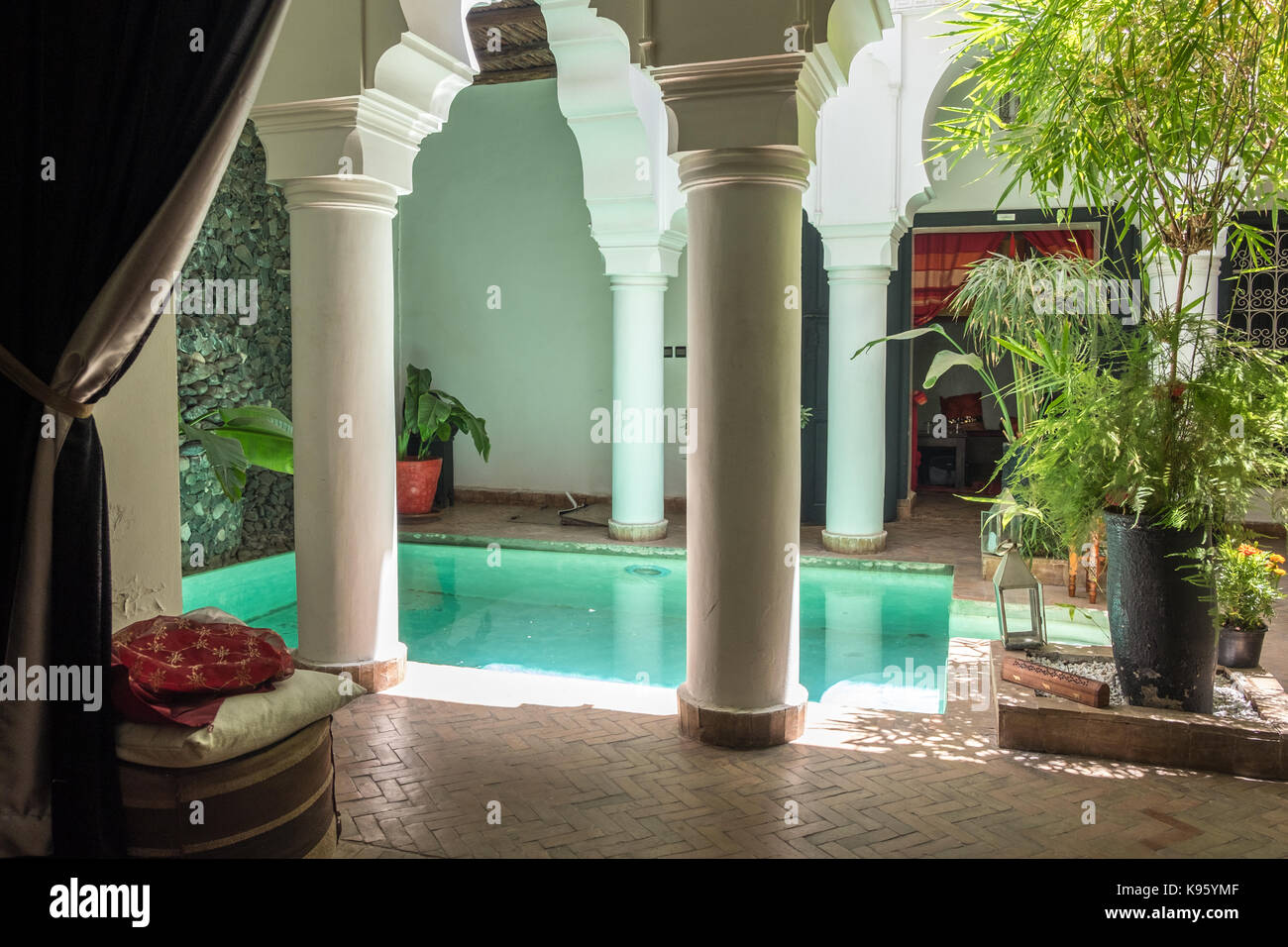 Pool and seating area inside Riad L'Orangee Marrakech Morocco Stock ...