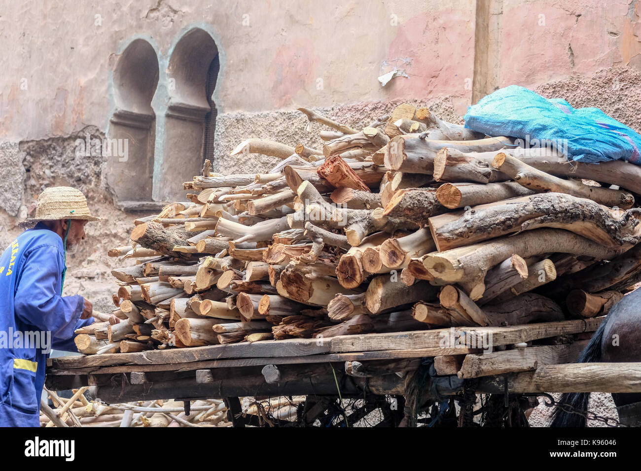 Local with barrow of wood in Marrakech, Morocco Stock Photo - Alamy