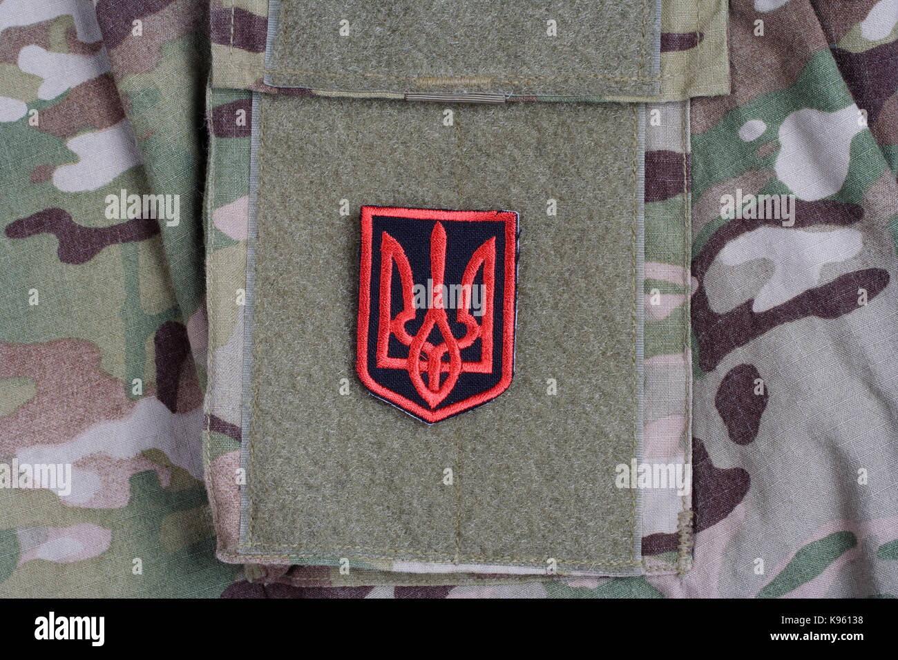 KYIV, UKRAINE - July, 16, 2015. Ukraine Army uniform badge - trident ...