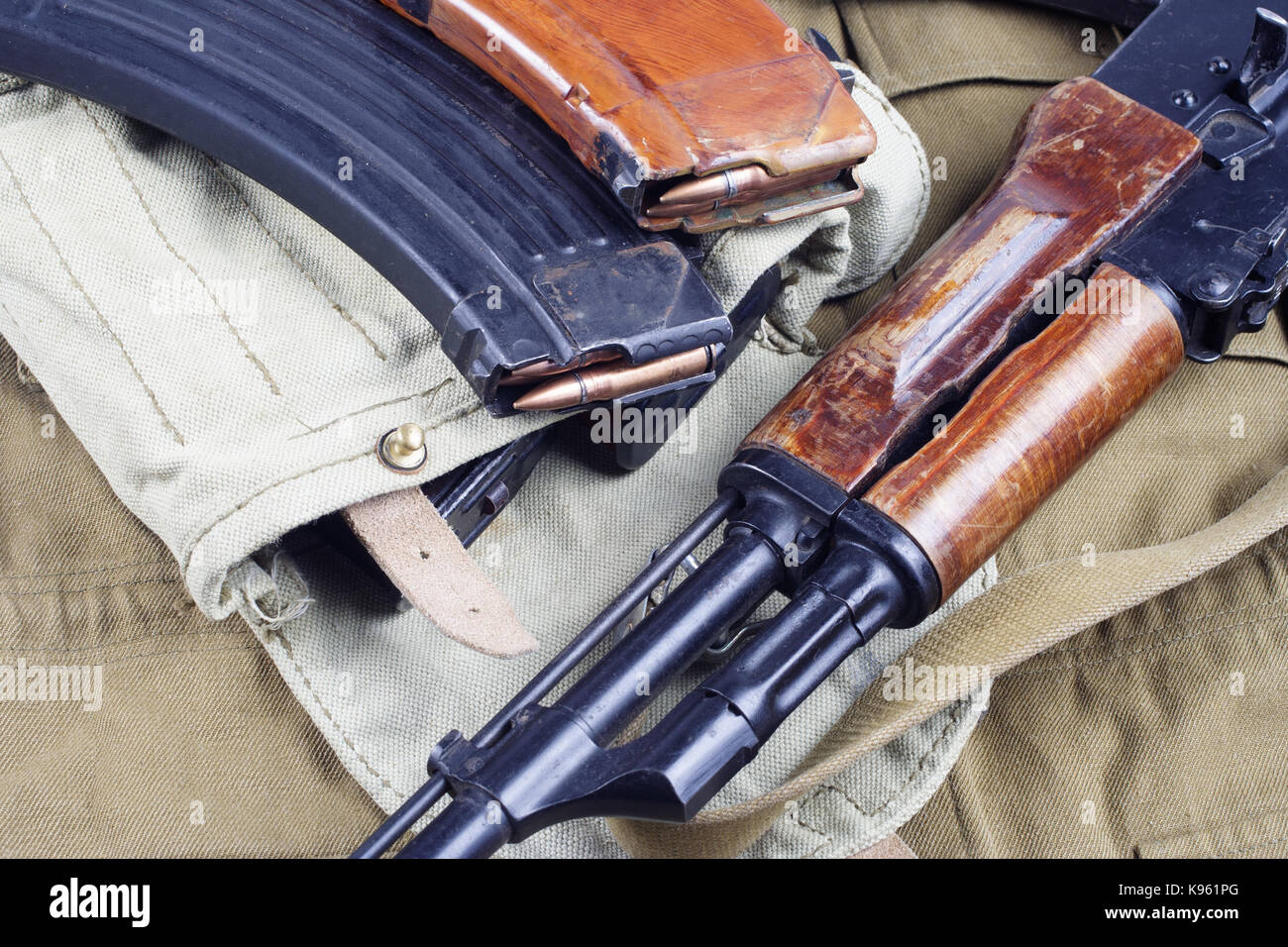 AK 47 on USSR Soviet Army khaki uniform background Stock Photo - Alamy