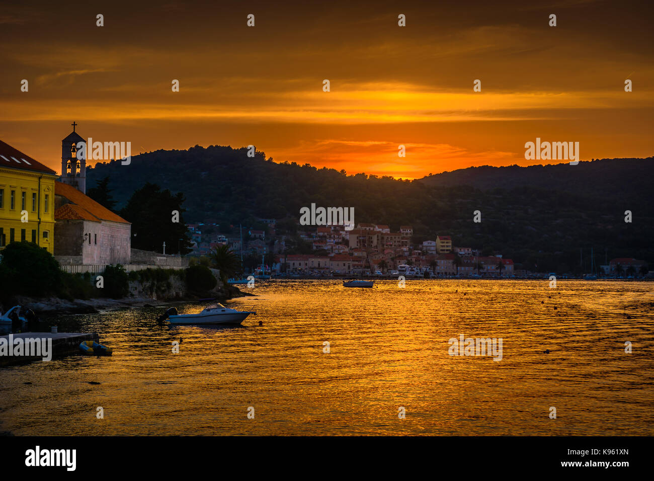 Golden sunset over Vis town in South of Croatia, Mediterranean Stock ...