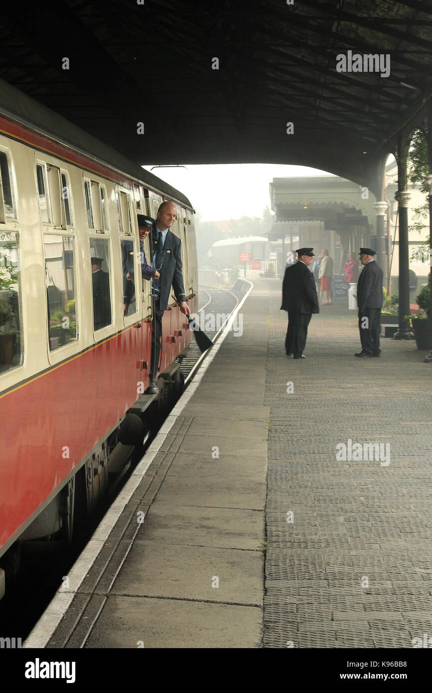 Steam train departing from Boness Museum station platform with day ...