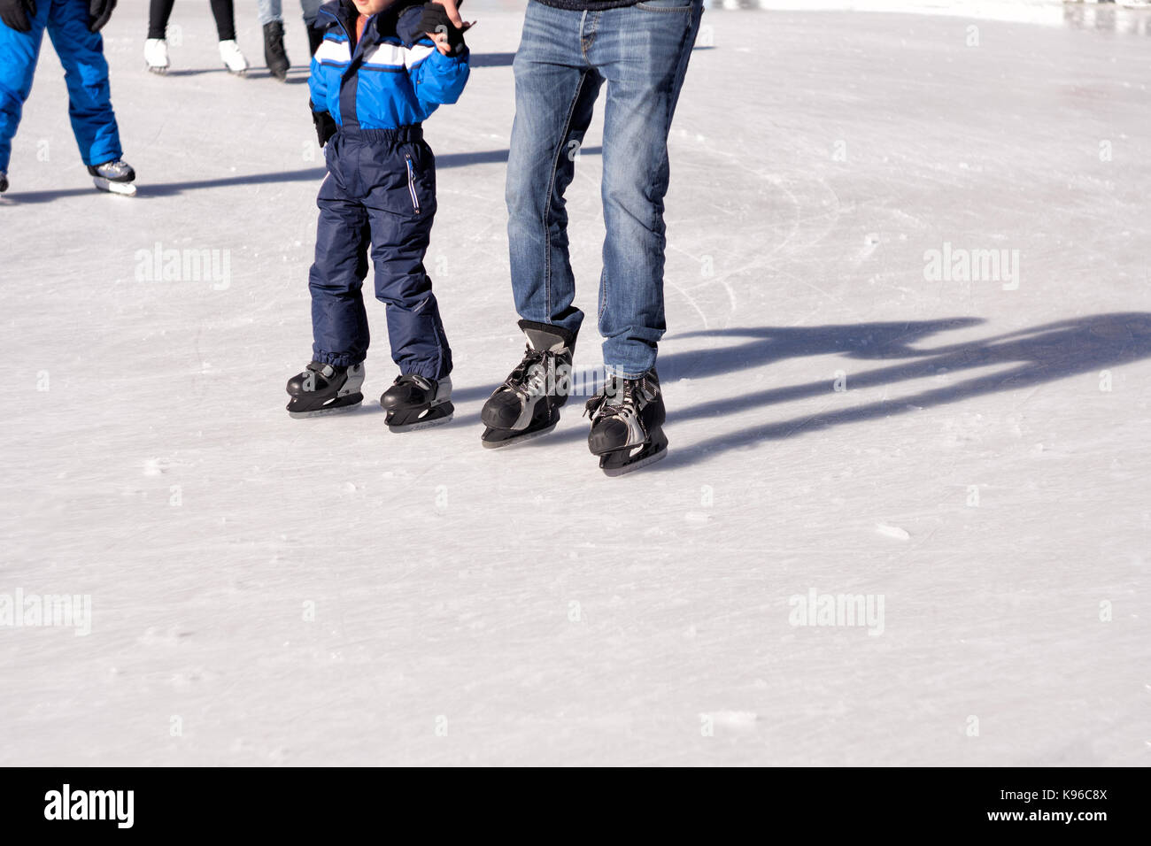 Woman ice skating shadow hi-res stock photography and images - Alamy