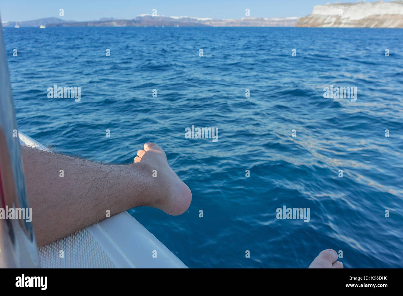 Man feet with a view of the sea Stock Photo - Alamy