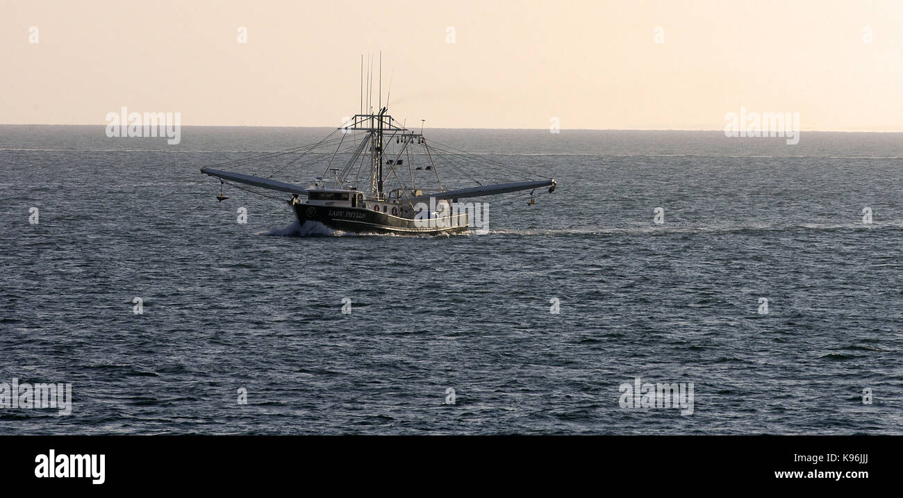 Fishing Vessel "Lady Phyllis" with outriggers deployed between Cape Cod ...
