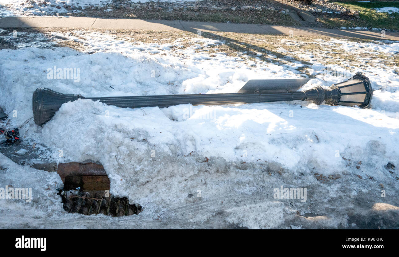 Fallen decorative street light hit by a car which probably slipped on a ...
