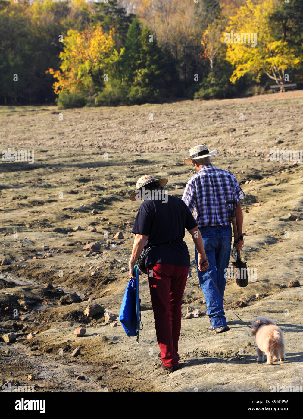 Older couple, with pet, visit the Crater of Diamonds State Park in ...
