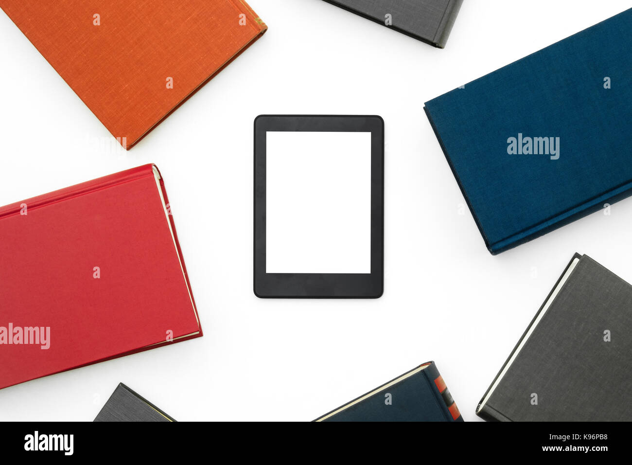 E-book device with books in white isolated background Stock Photo - Alamy