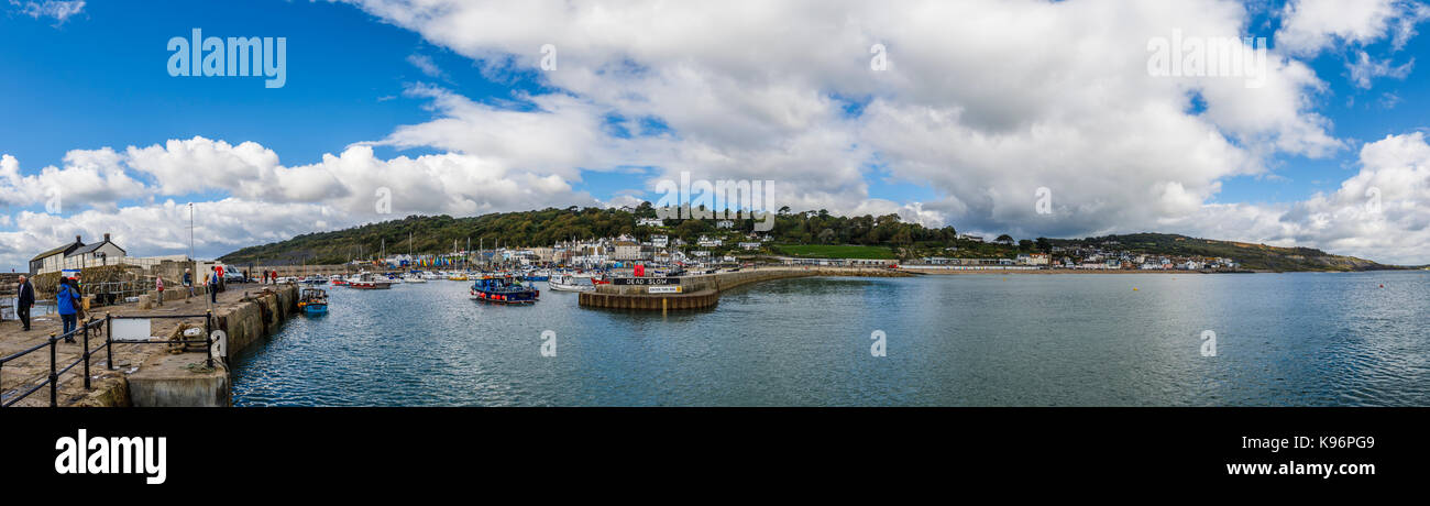 Panoramic view from The Cobb, Lyme Bay and Lyme Regis harbour, a ...