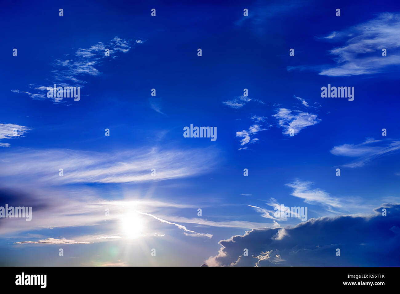 Bright dramatic sunset sky with sun. Outdoors background Stock Photo ...