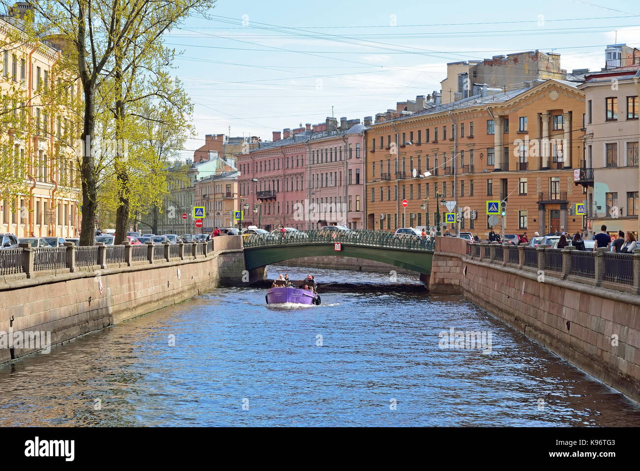 Lilac boat sails on the Canal in St. Petersburg Stock Photo - Alamy