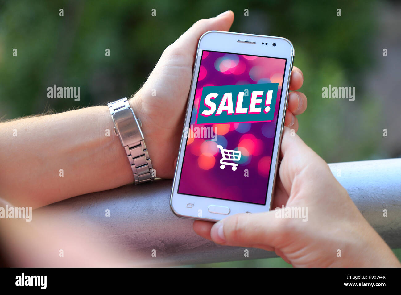 Sale advertising on the screen of cell phone. Publicity. Ecommerce ...