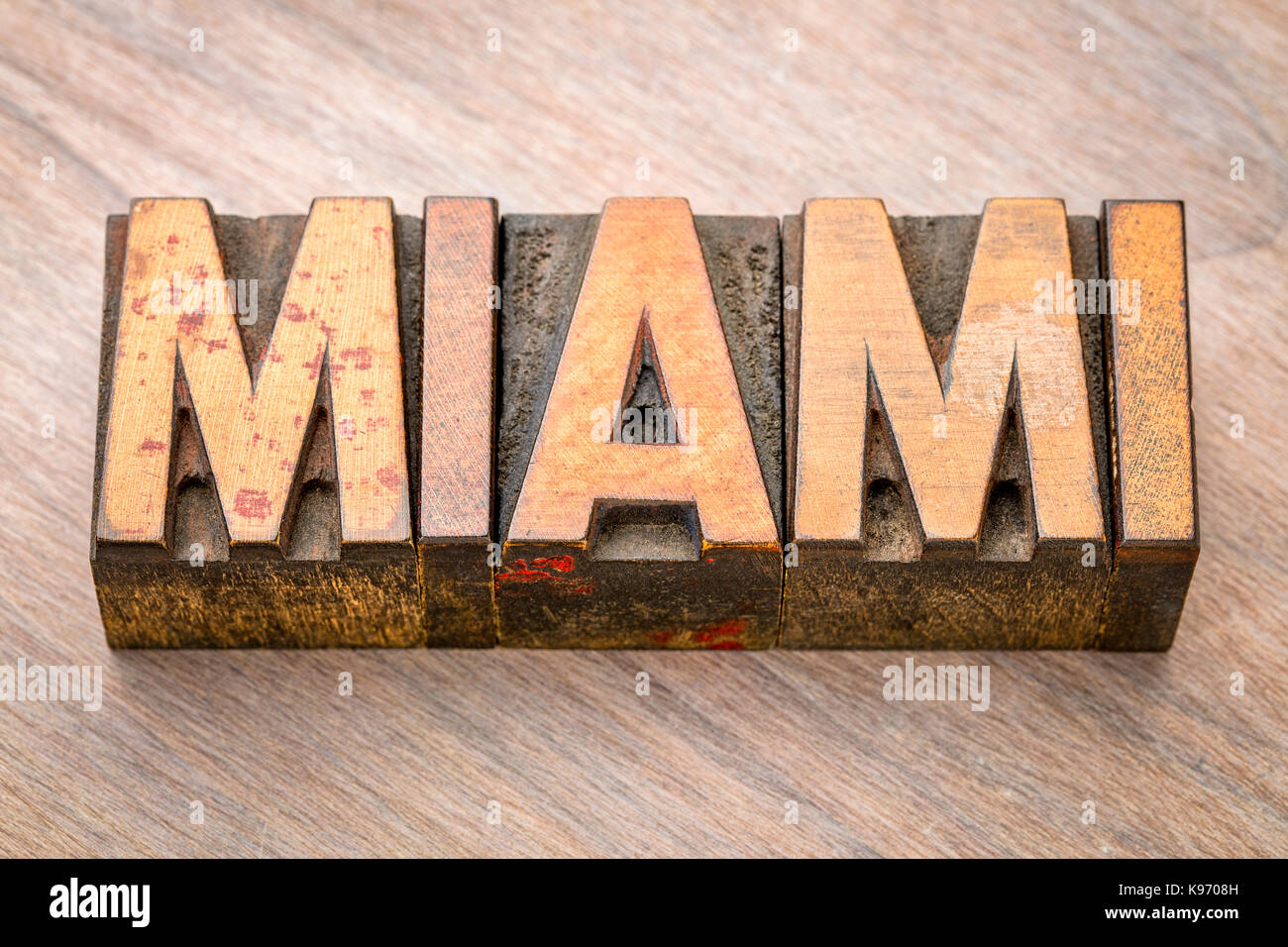 Miami word abstract in vintage letterpress wood type against grained ...